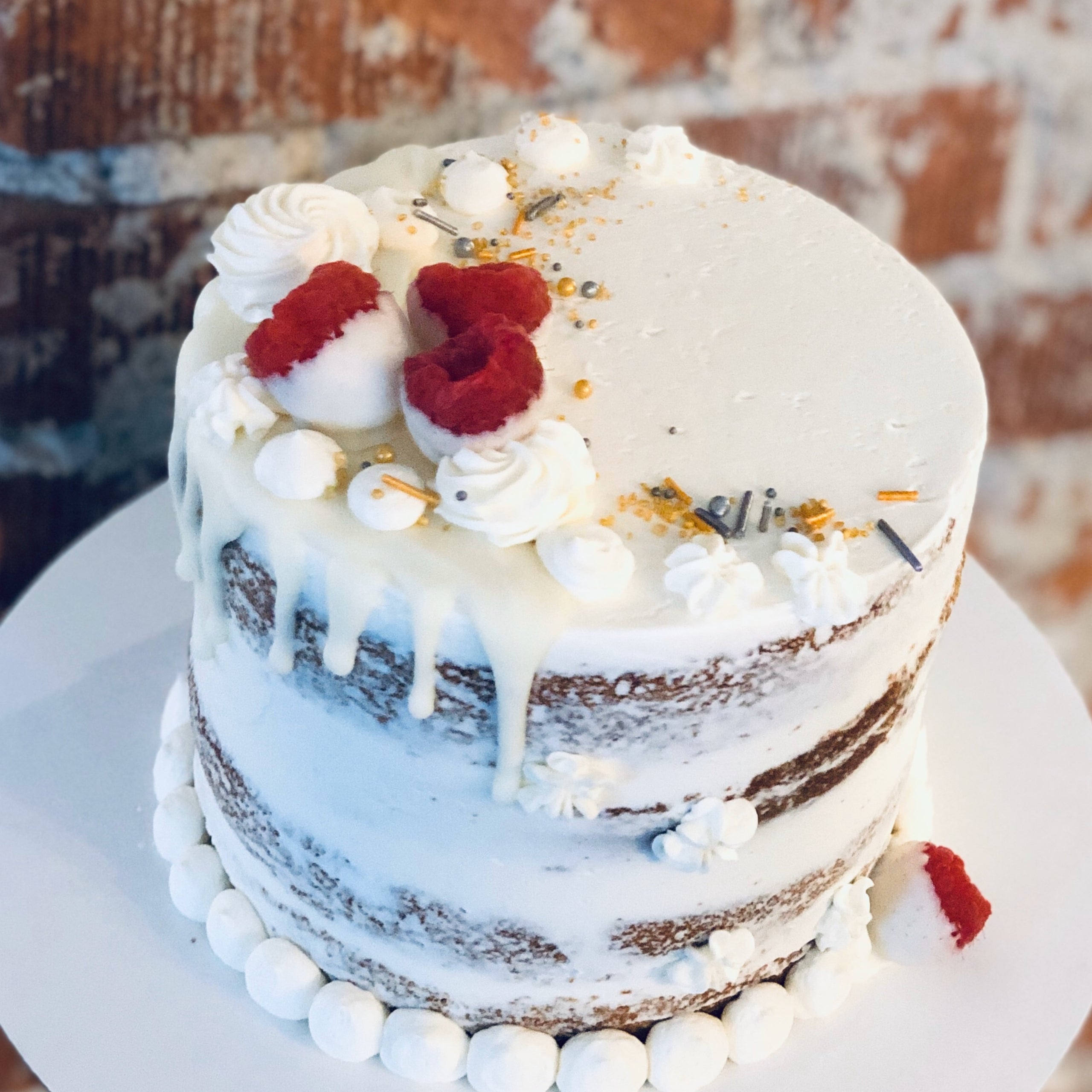 V-Day Speckled Pink Raspberry Cake | Porters Coffeehouse and Bakery